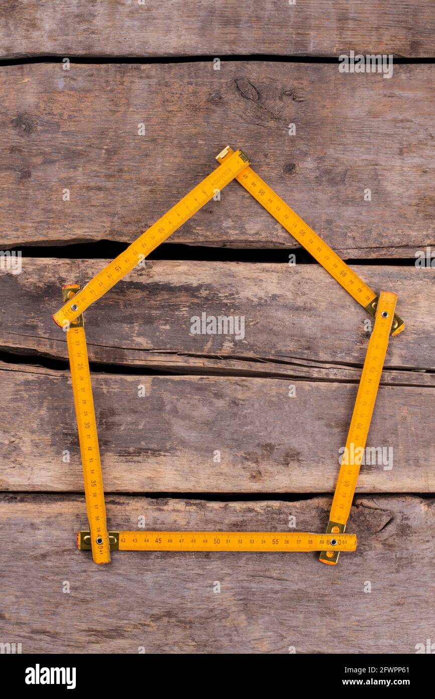 Construction folding ruler house shape hi-res stock photography and ...