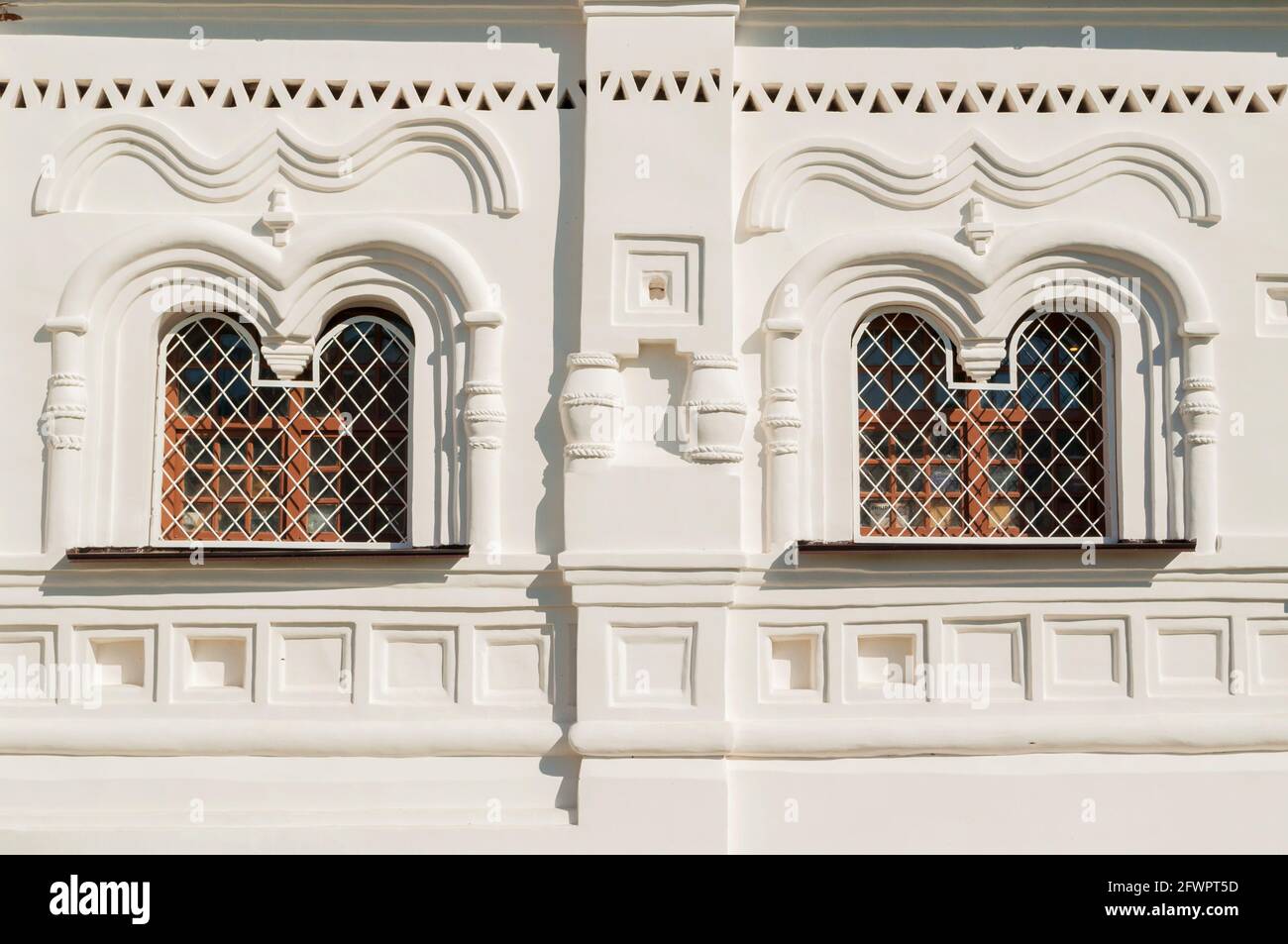 Windows with medieval sculpture details in Varlaam Khutyn monastery ...