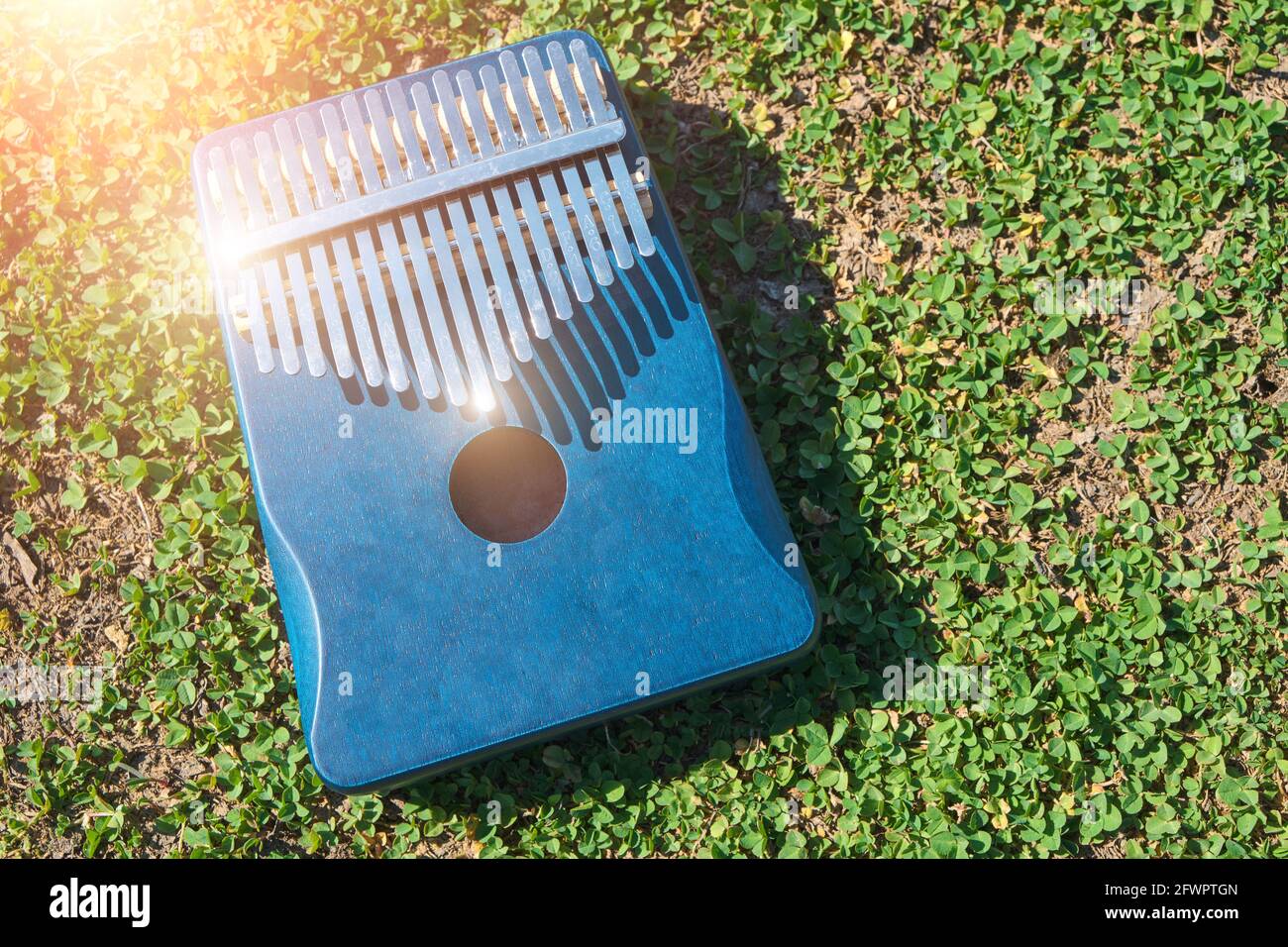 African Musical Instrument Kalimba On The Green Grass Stock Photo - Alamy
