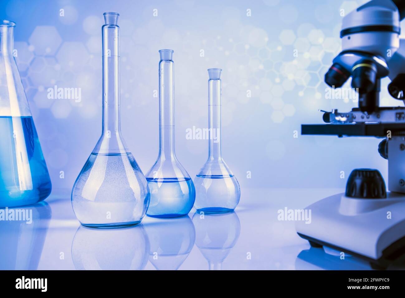 Microscope, Laboratory beakers,Science experiment Stock Photo - Alamy