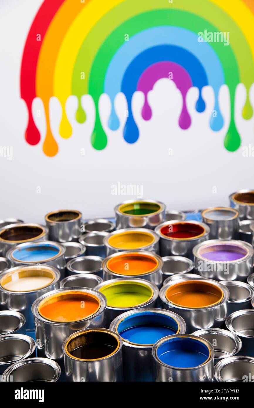 Rainbow colors, Open cans of paint Stock Photo - Alamy