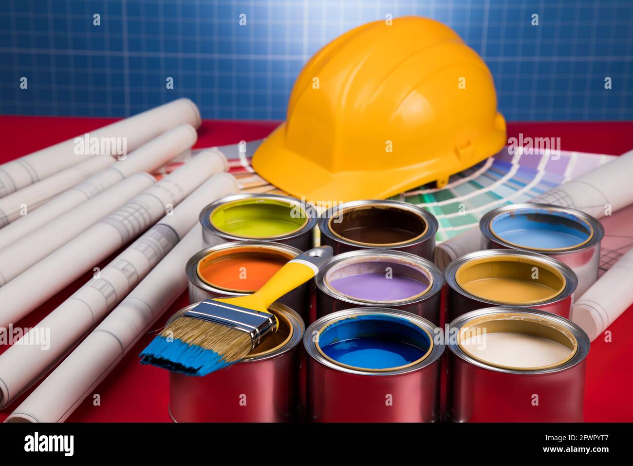 Paint brush, tin can and color guide samples Stock Photo - Alamy