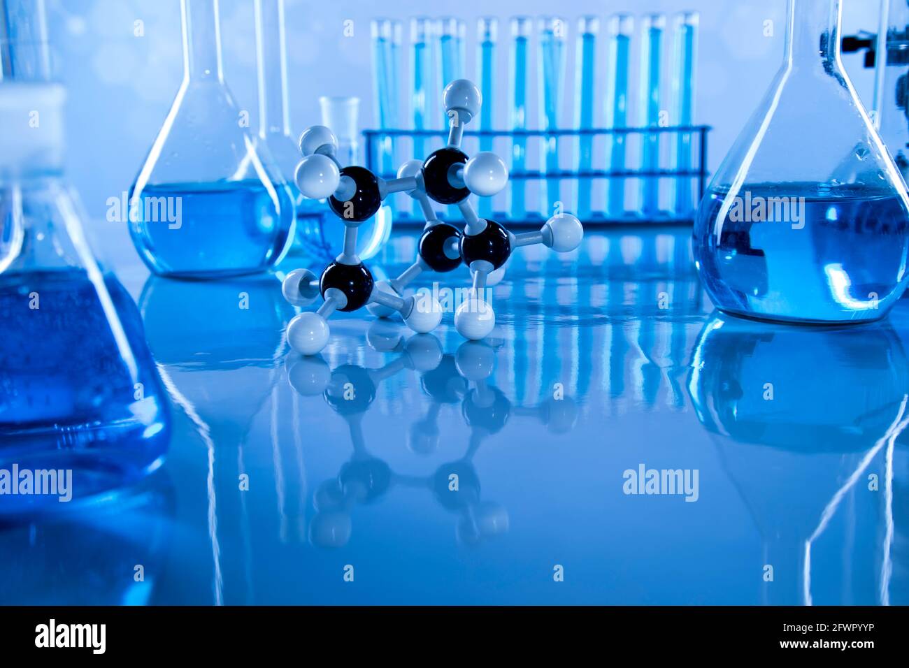 Laboratory equipment, glass filled background Stock Photo - Alamy