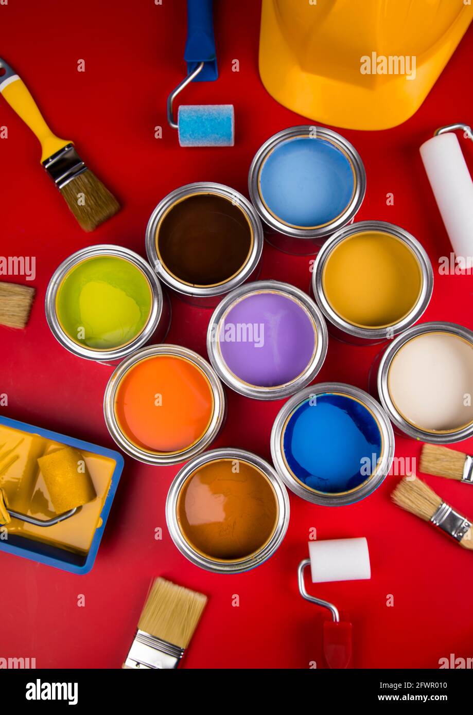 Paint brush, tin can and color guide samples Stock Photo - Alamy