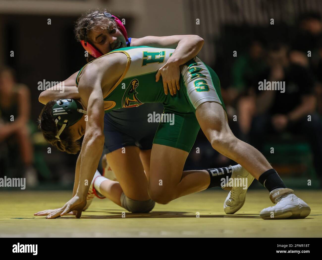 High School wrestling action under the spotlight with Coeur d'Alene vs ...