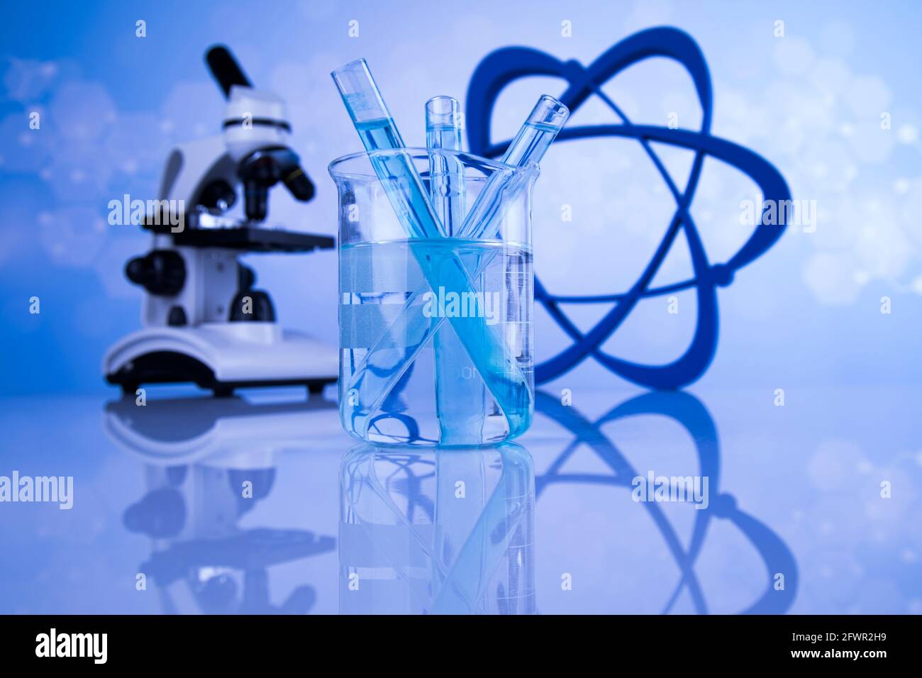 Laboratory equipment, glass filled background Stock Photo - Alamy