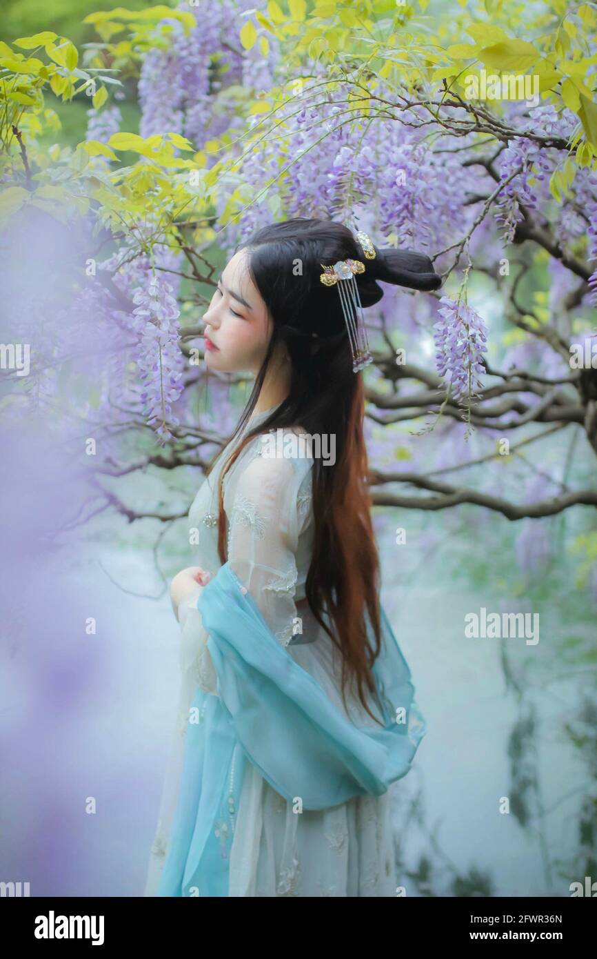 Mountains green water blue sky white clouds river flowers chinese girl ...