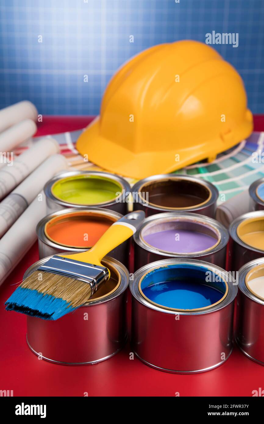 Paint brush, tin can and color guide samples Stock Photo - Alamy