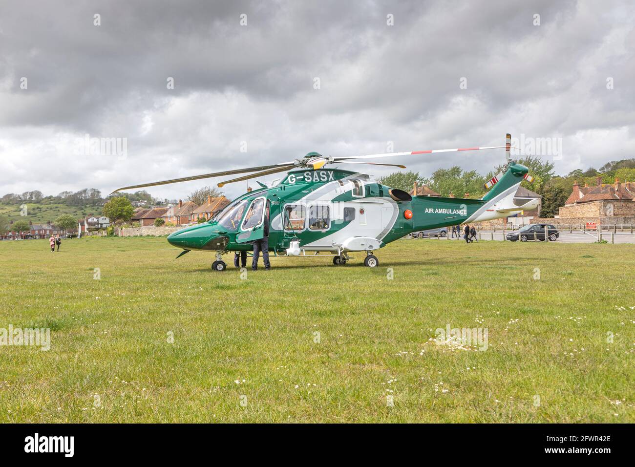 An air ambulance landed on Hythe Green, Kent Stock Photo - Alamy