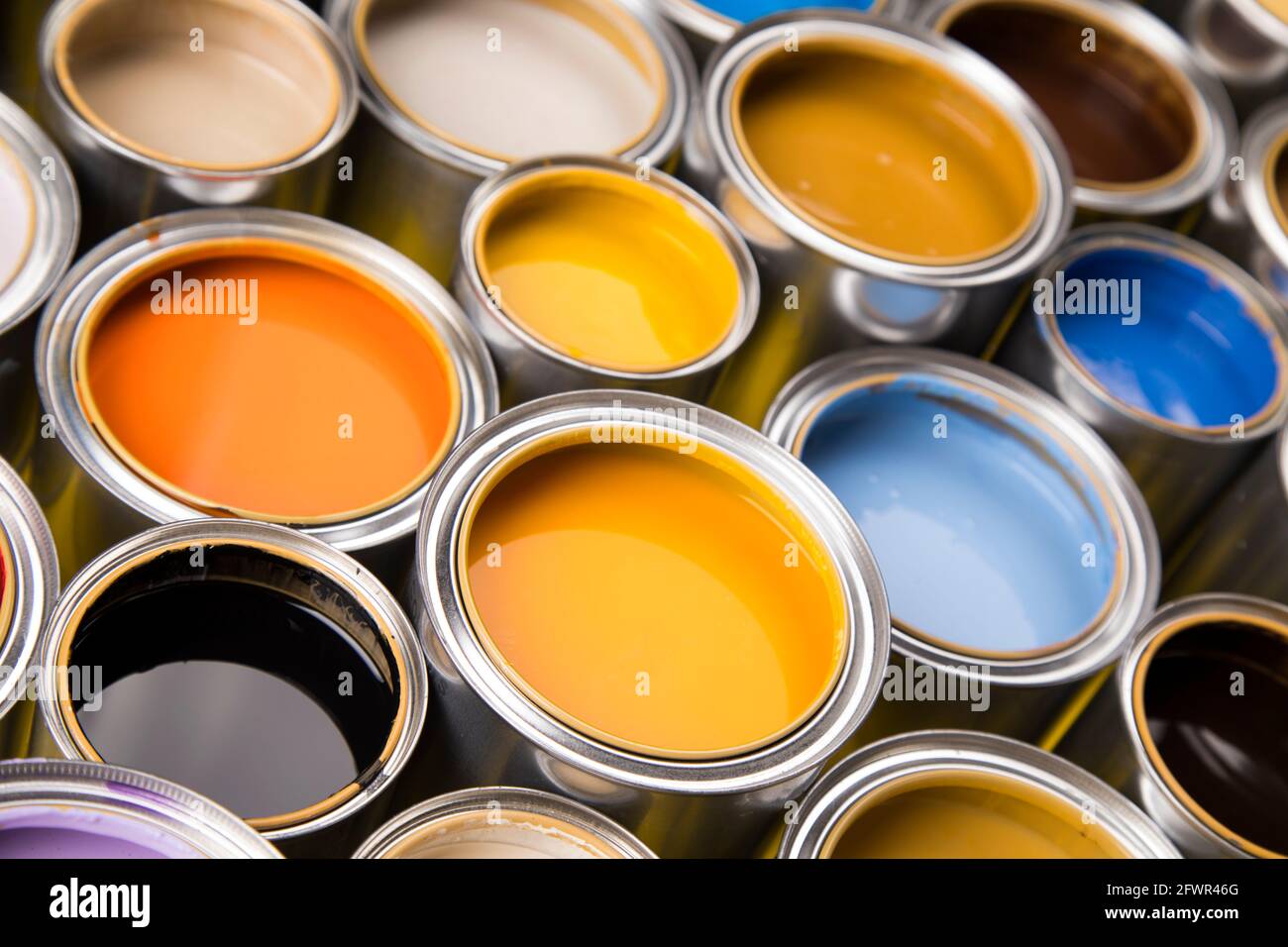 Open buckets with a paint, colors background Stock Photo - Alamy