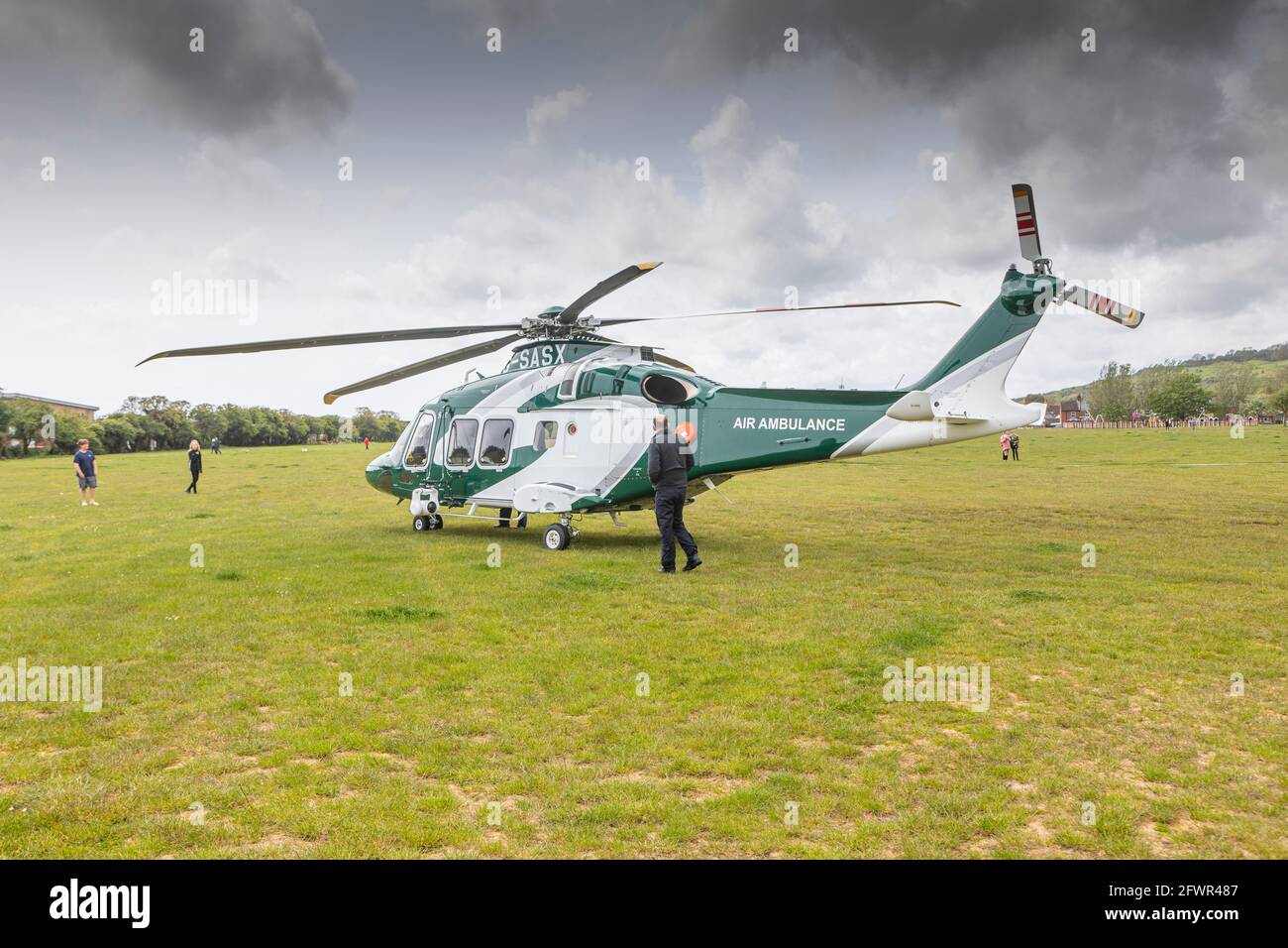 An air ambulance landed on Hythe Green, Kent Stock Photo - Alamy