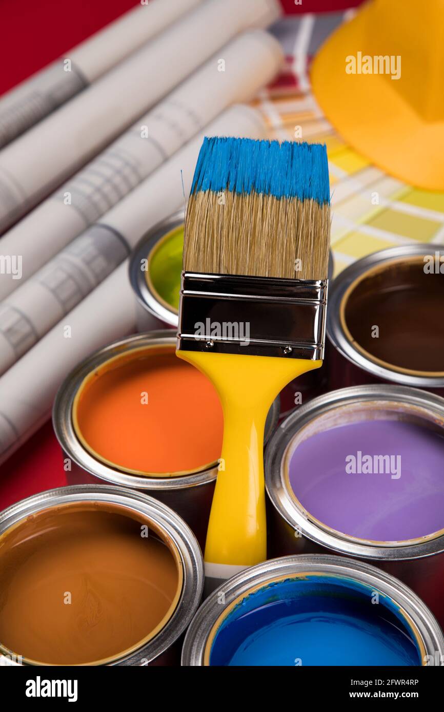 Paint brush, tin can and color guide samples Stock Photo - Alamy
