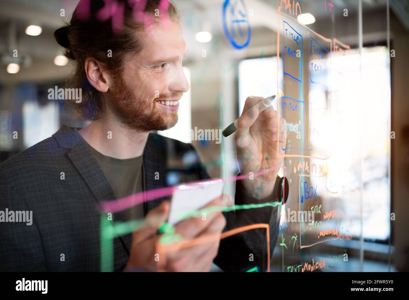 Programmer working developing software hi-res stock photography and ...