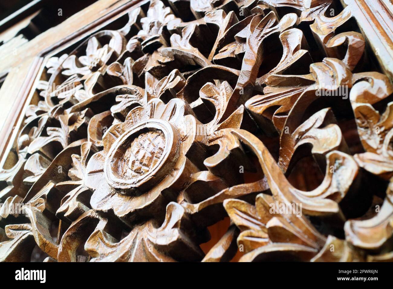 wood carvings on the walls of ancient houses photo Stock Photo - Alamy