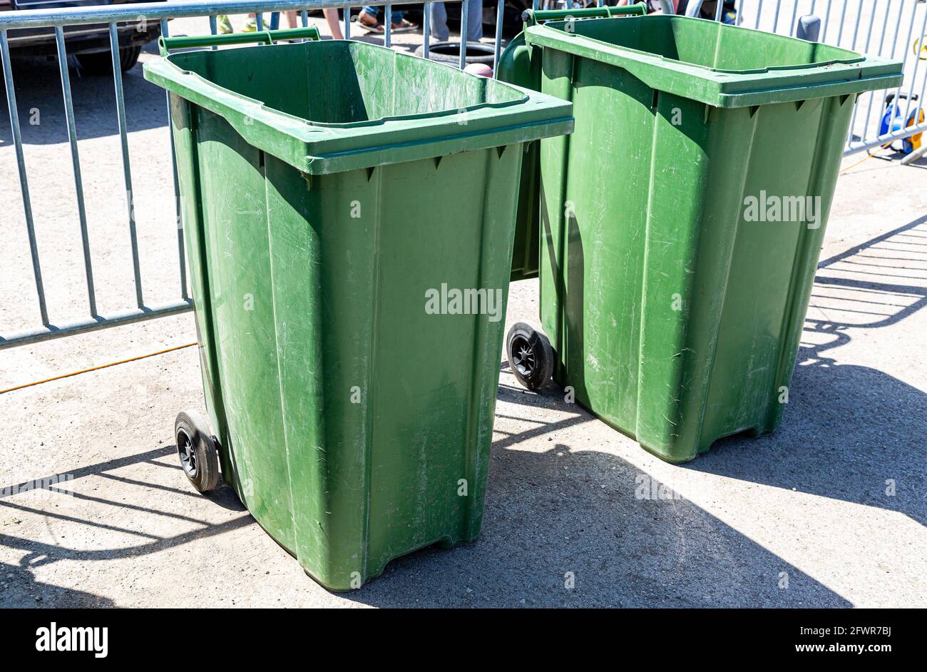Samara, Russia - May 15, 2021: Opened green plastic garbage bins. Trash ...