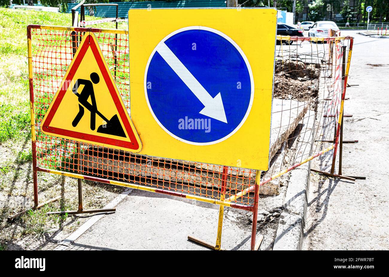 Road works traffic sign at the city street. Road under construction ...