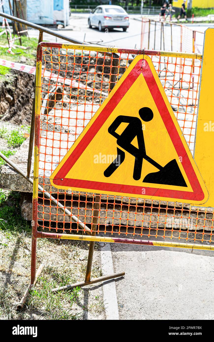 Road works traffic sign at the city street. Road under construction ...
