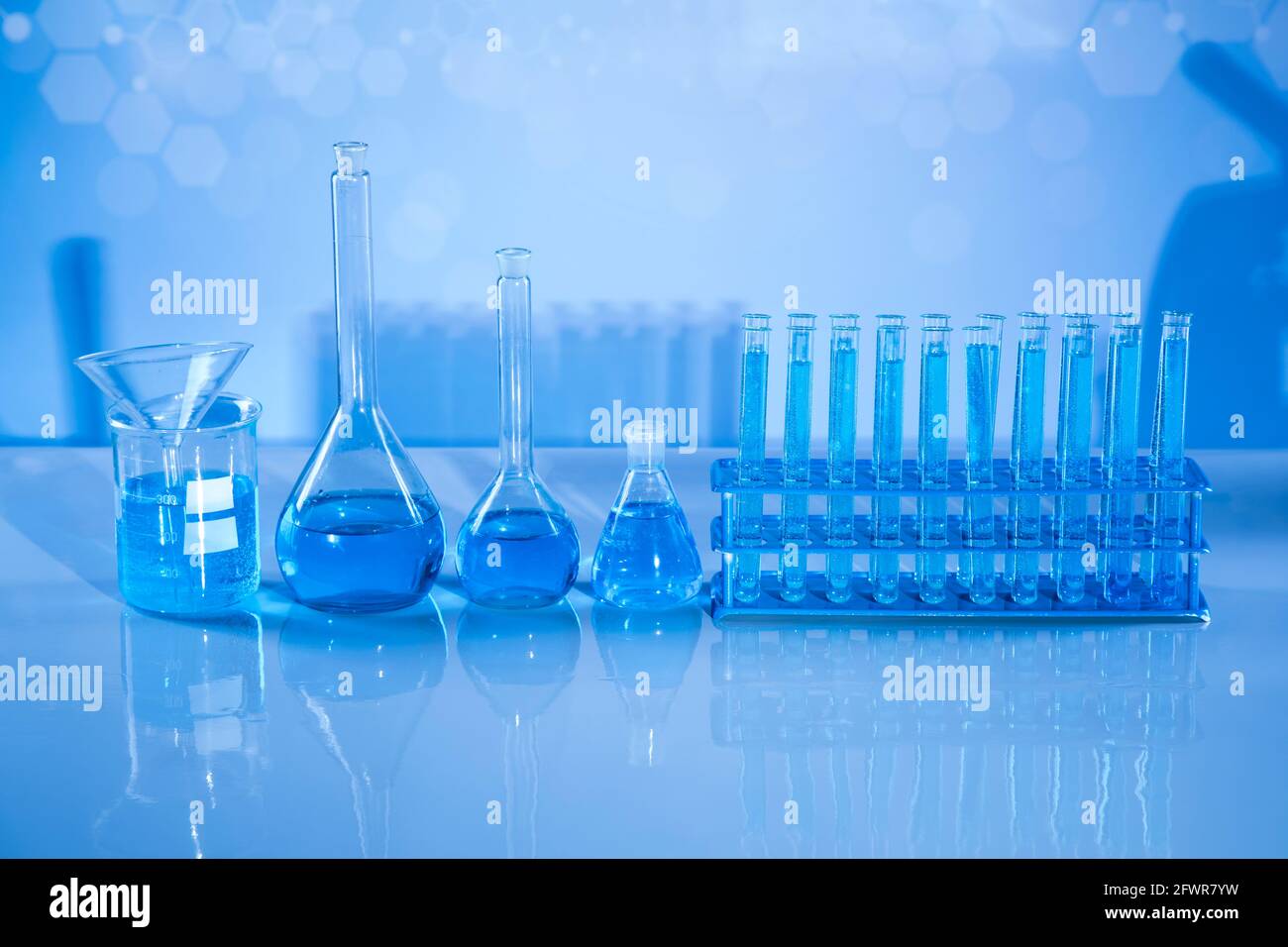Laboratory equipment, glass filled background Stock Photo - Alamy