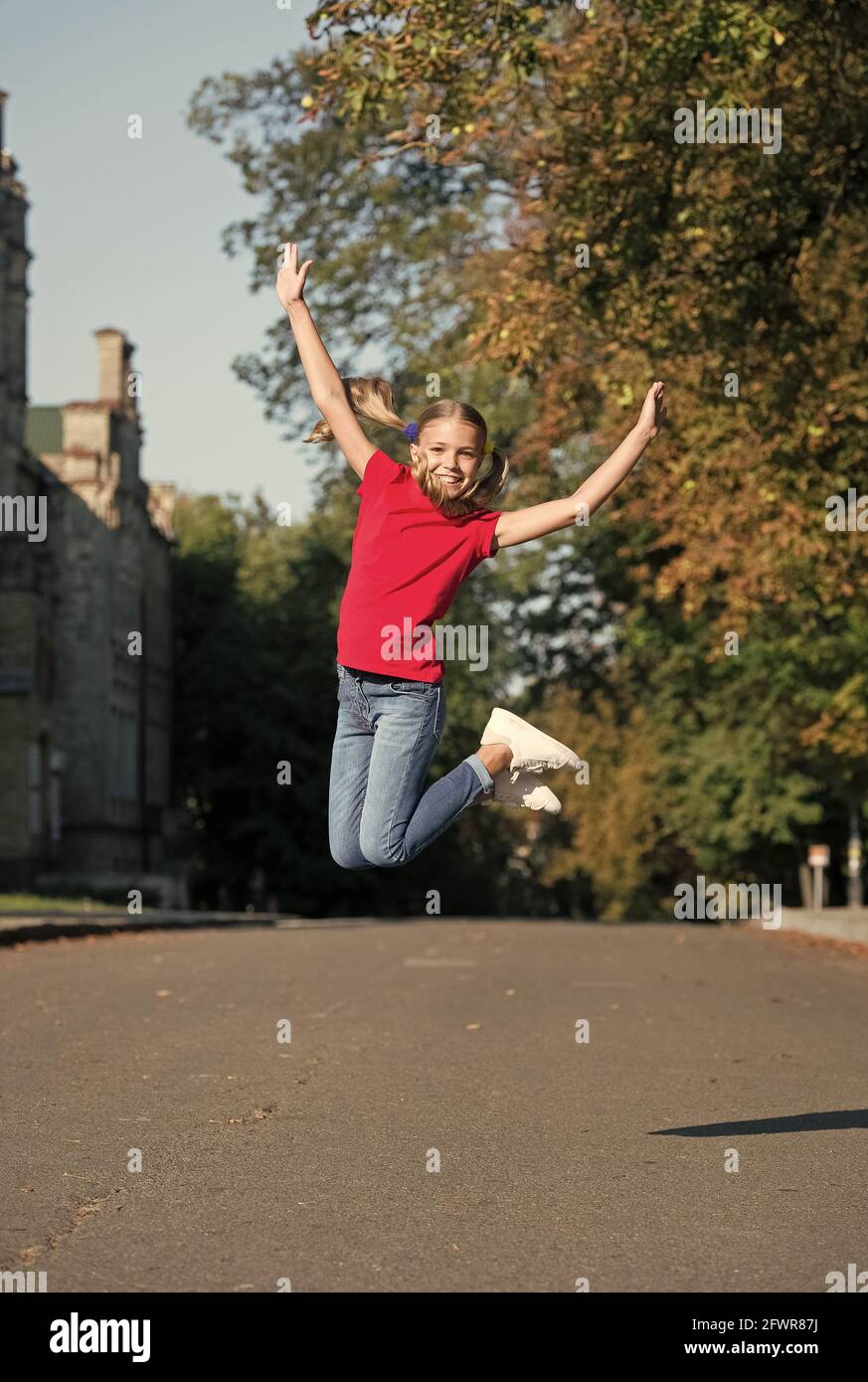 Do more of what makes you happy. Happy child jump high outdoors. Happy ...