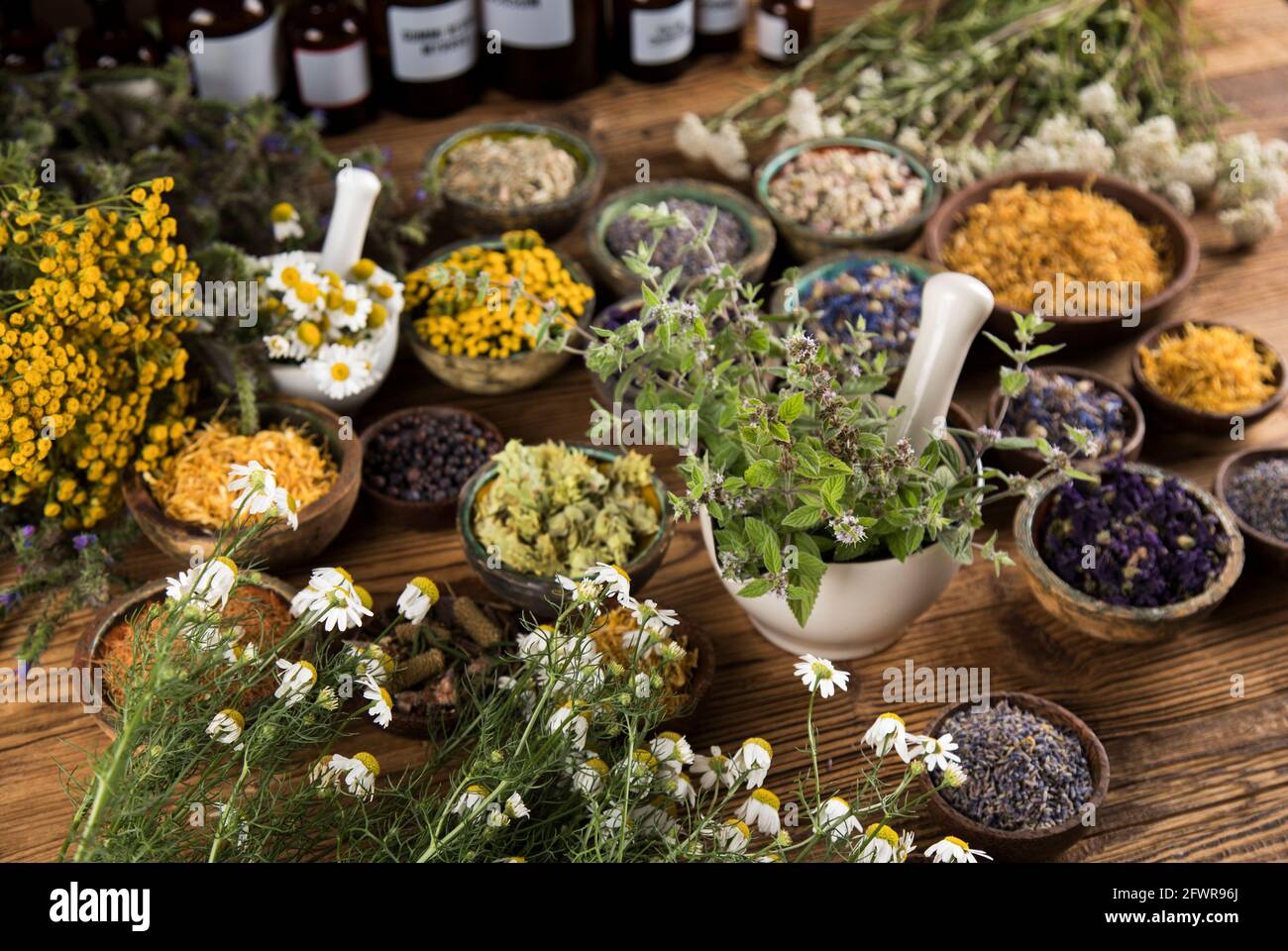Alternative medicine, dried herbs background Stock Photo - Alamy