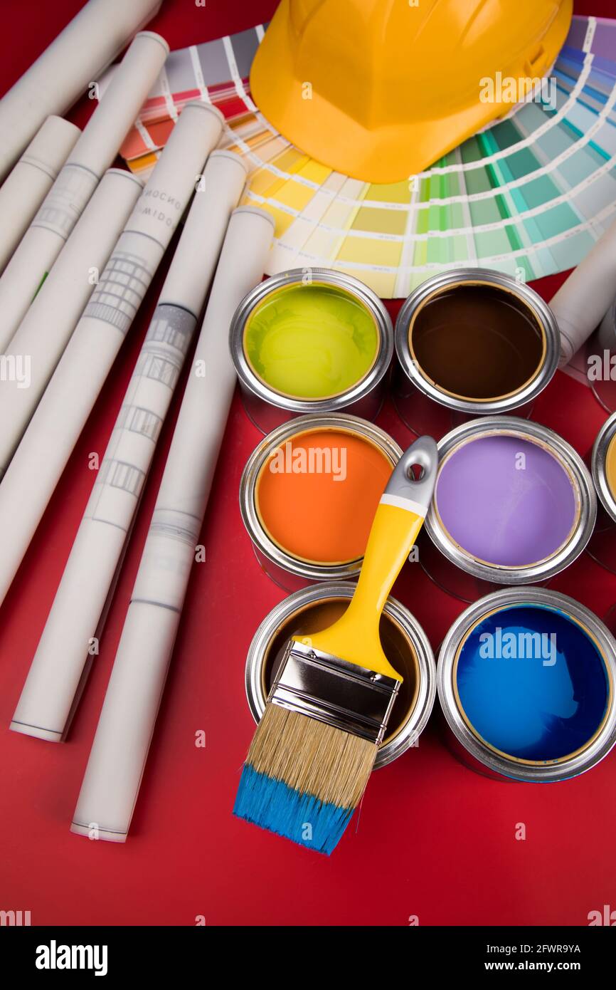 Paint brush, tin can and color guide samples Stock Photo - Alamy