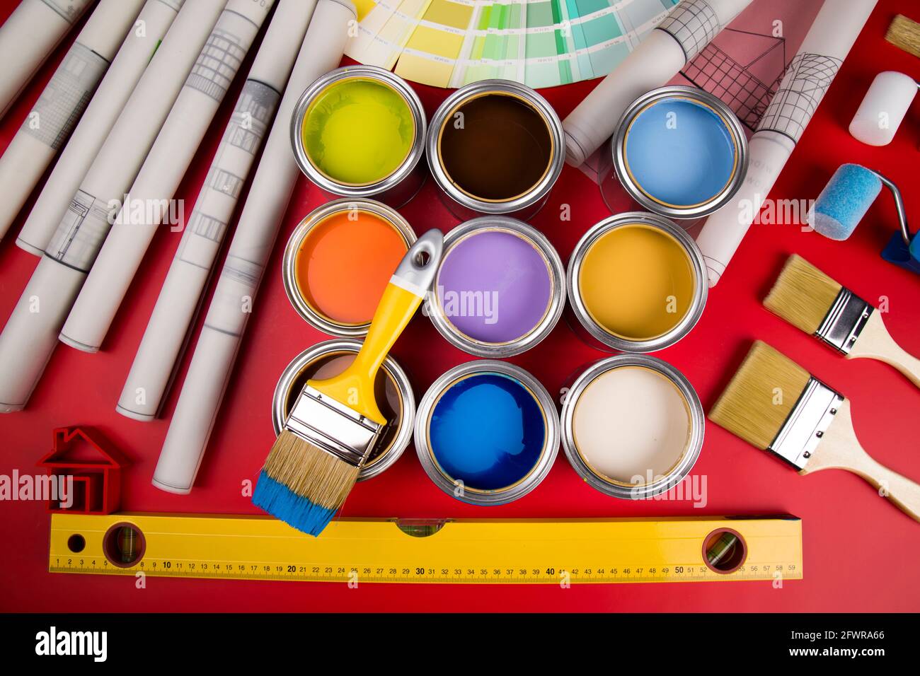 Paint brush, tin can and color guide samples Stock Photo - Alamy