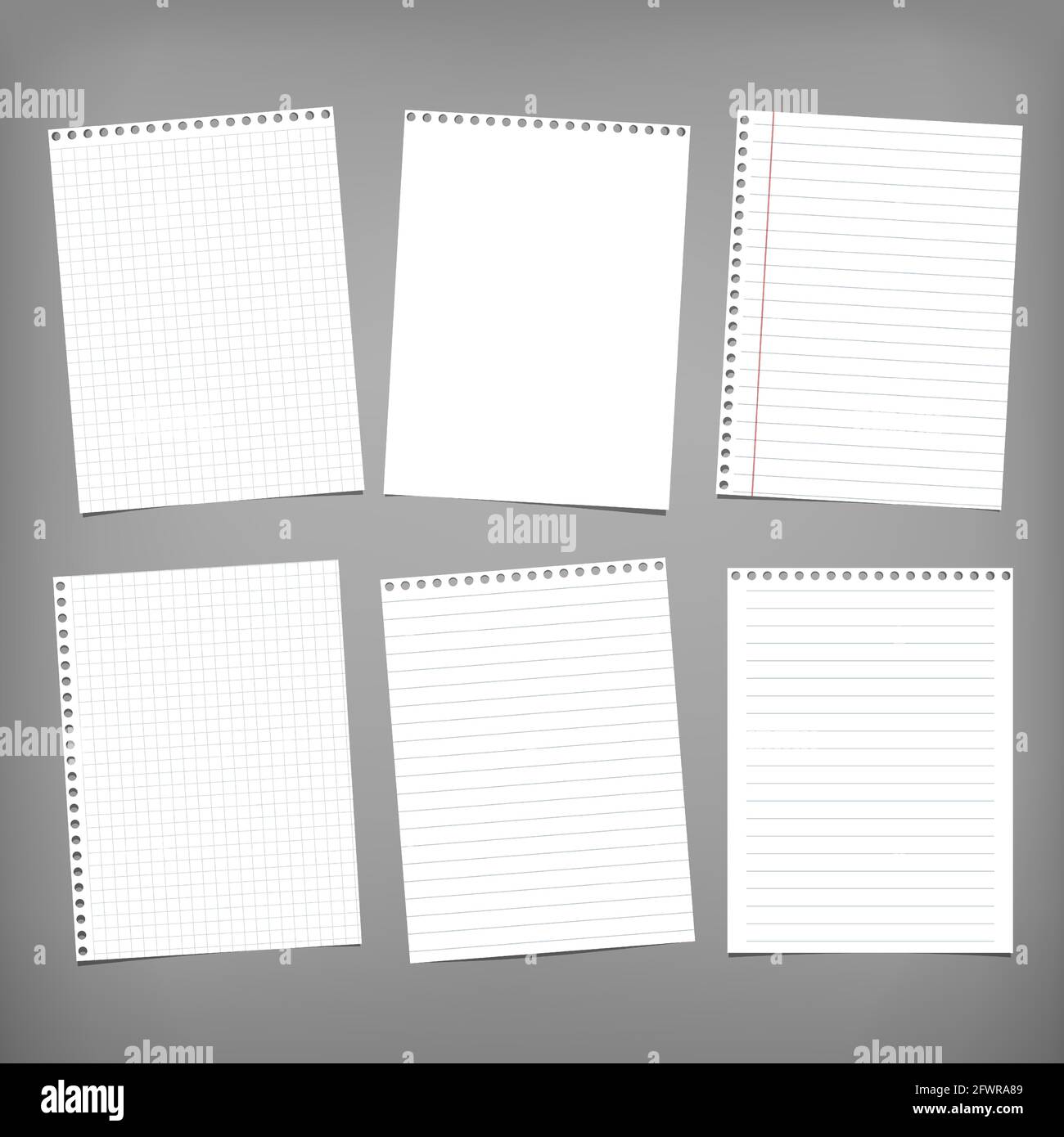 White, lined and squared note, notebook paper are on dark grey ...