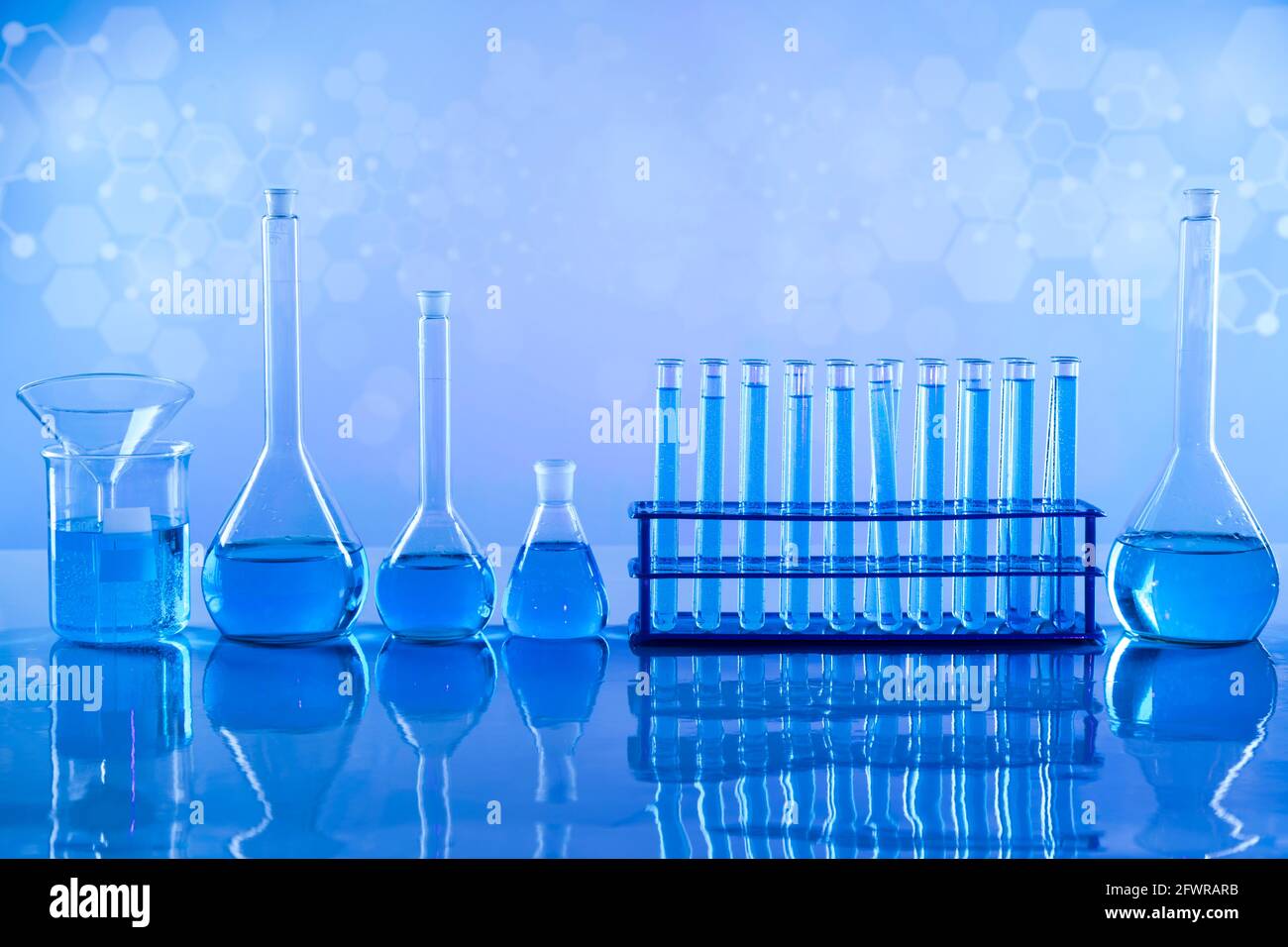 Laboratory equipment, glass filled background Stock Photo - Alamy