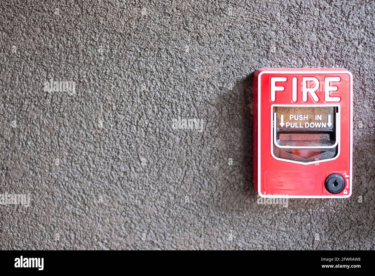Fire alarm switch on the wall, powerful emergency equipment for ...