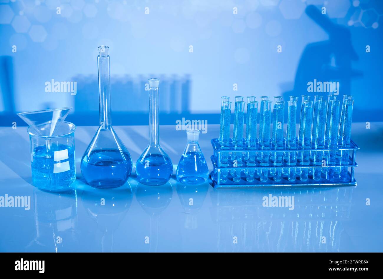 Laboratory equipment, glass filled background Stock Photo - Alamy