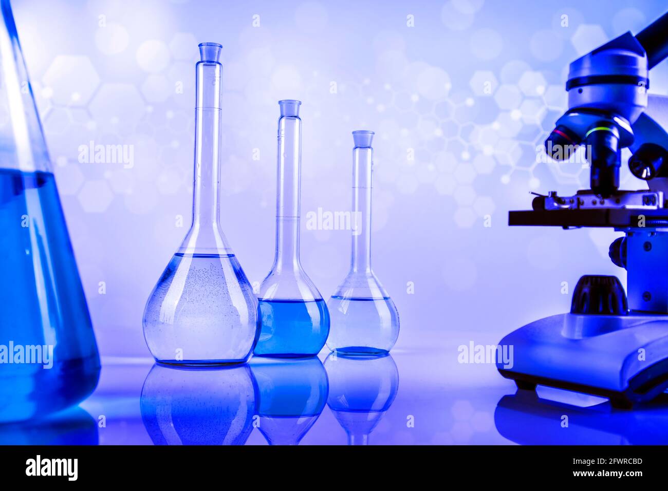 Microscope, Laboratory beakers,Science experiment Stock Photo - Alamy