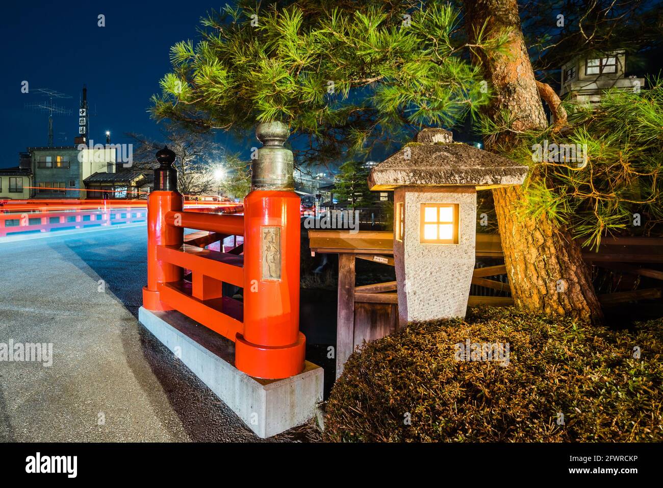 Beautiful view of a bridge with orange painted wooden fences in ...