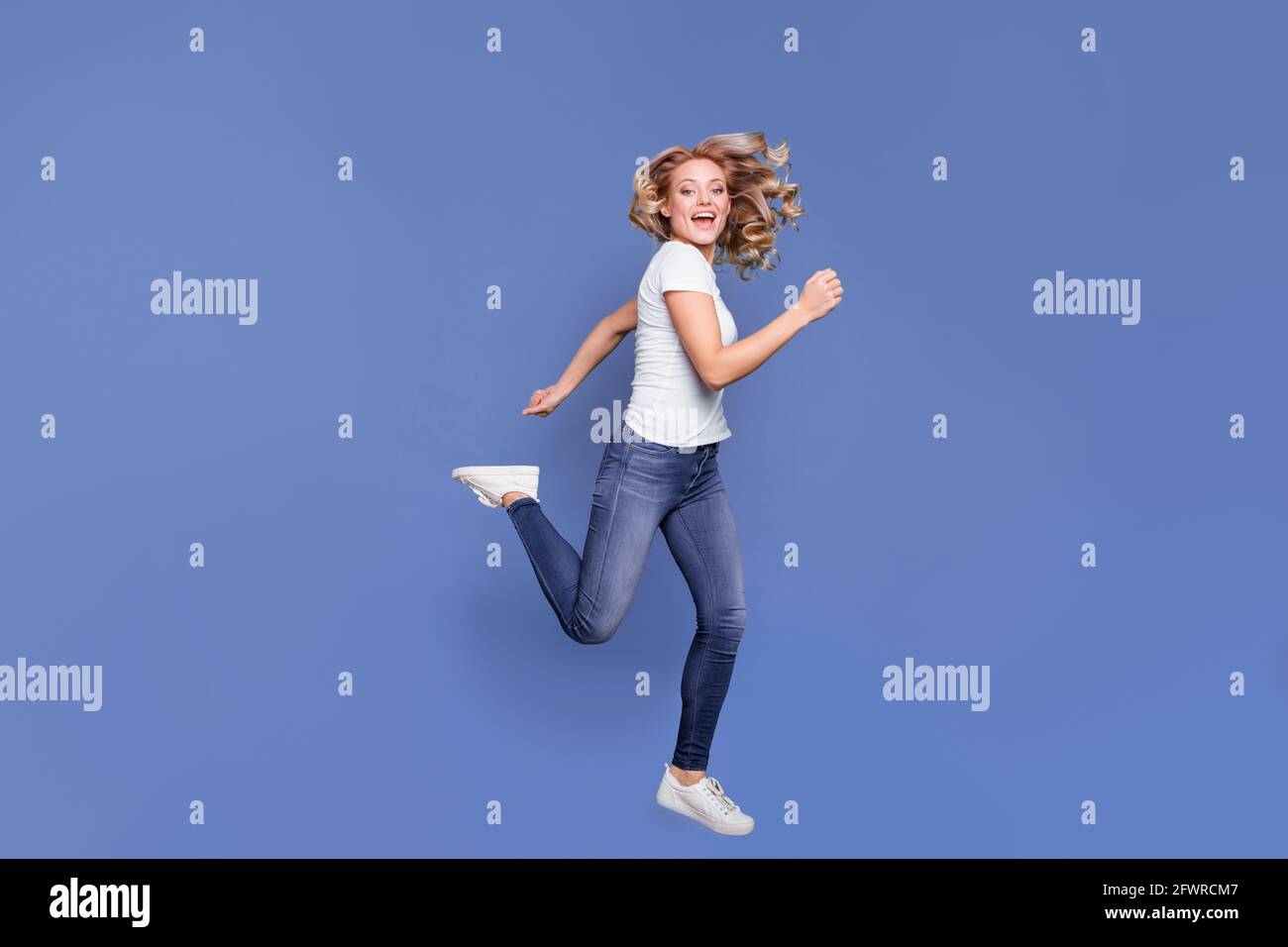 Full length body size view of charming glad cheerful wavy-haired girl ...