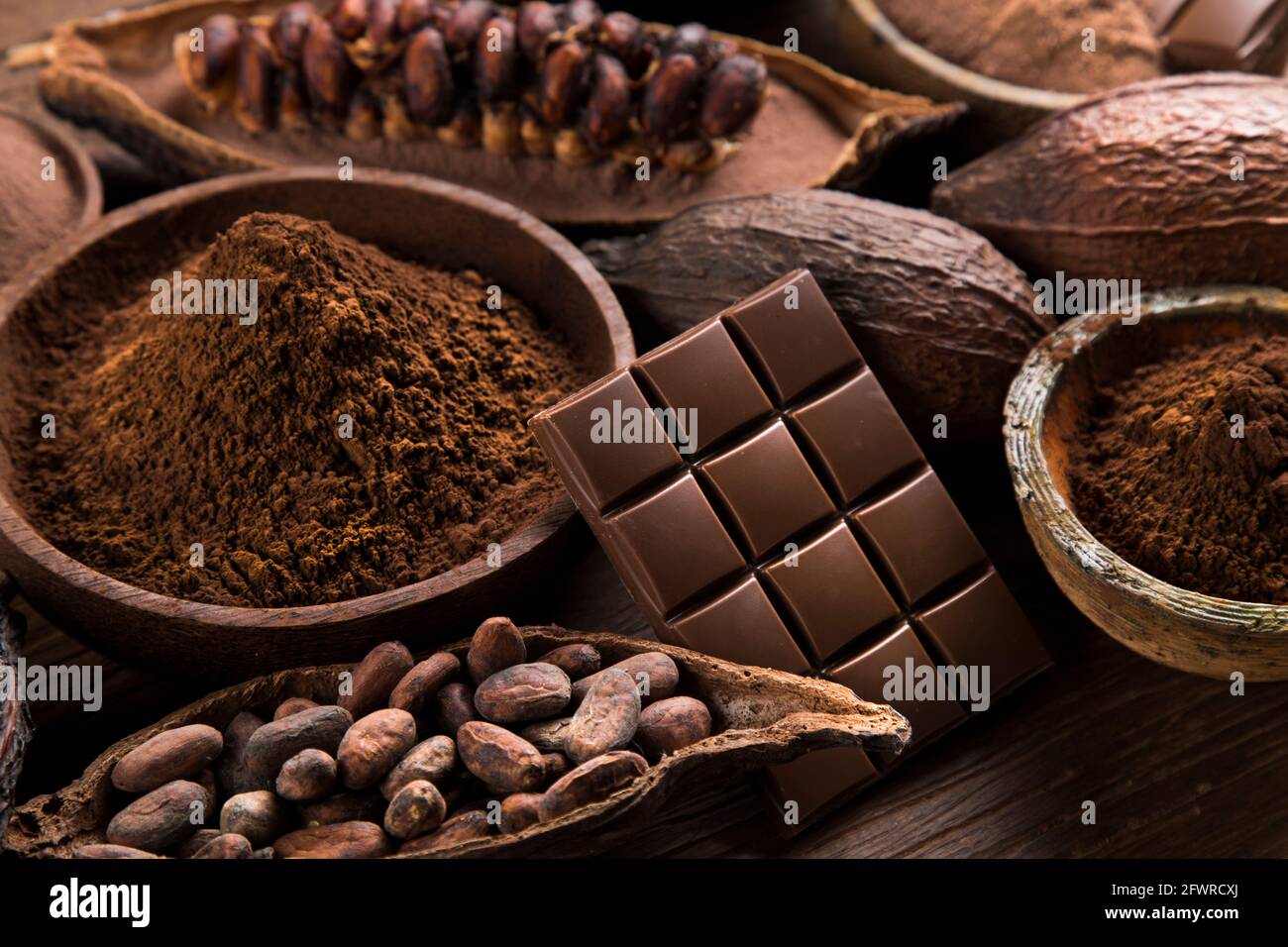 Chocolate bar, candy sweet, cacao beans and powder Stock Photo - Alamy