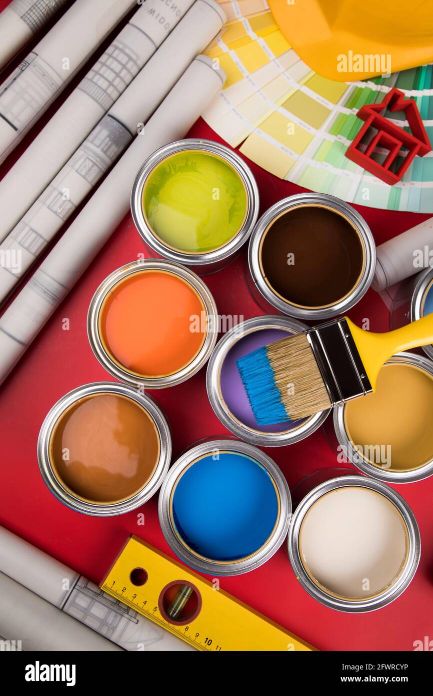 Paint brush, tin can and color guide samples Stock Photo - Alamy