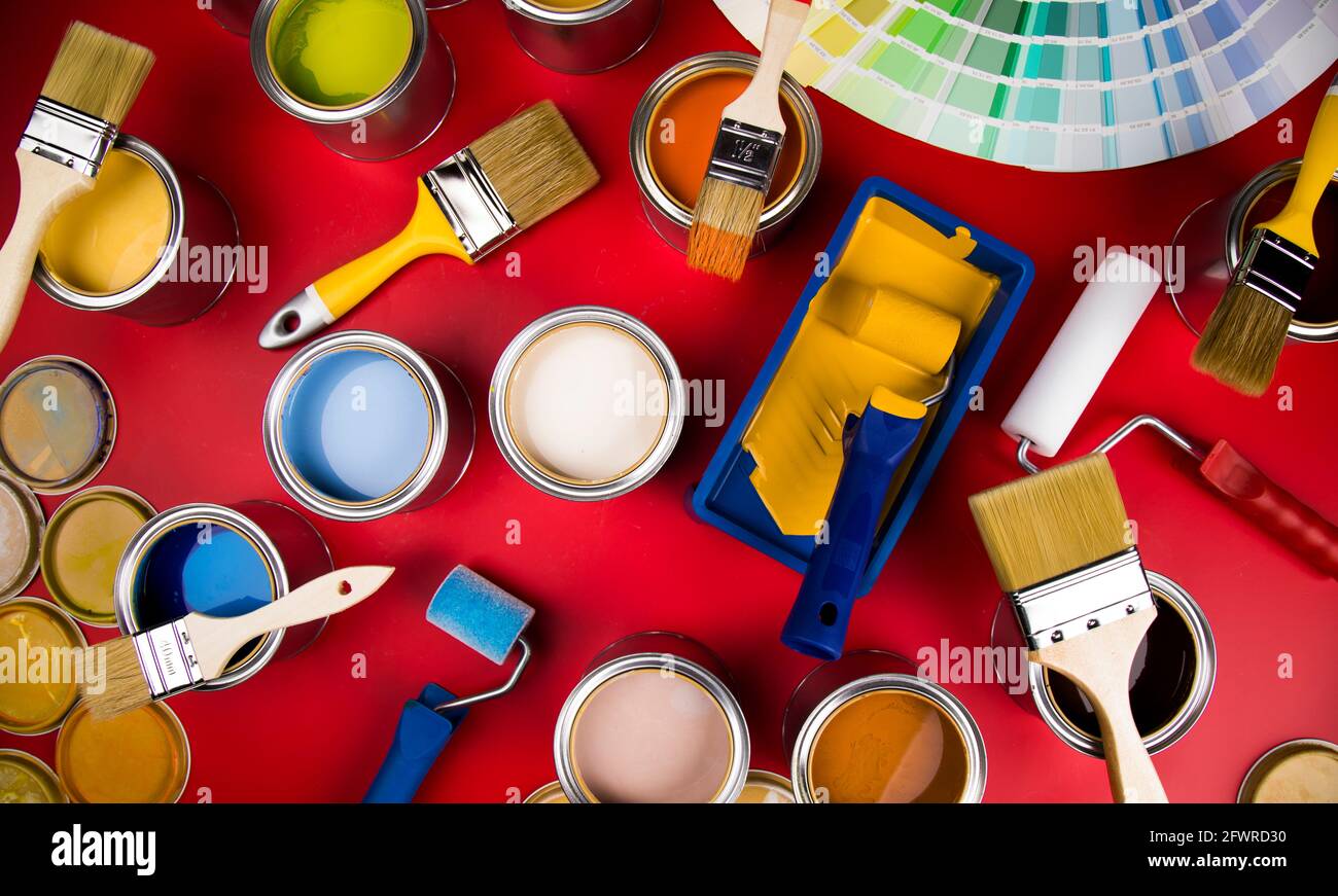 Paint brush, tin can and color guide samples Stock Photo - Alamy