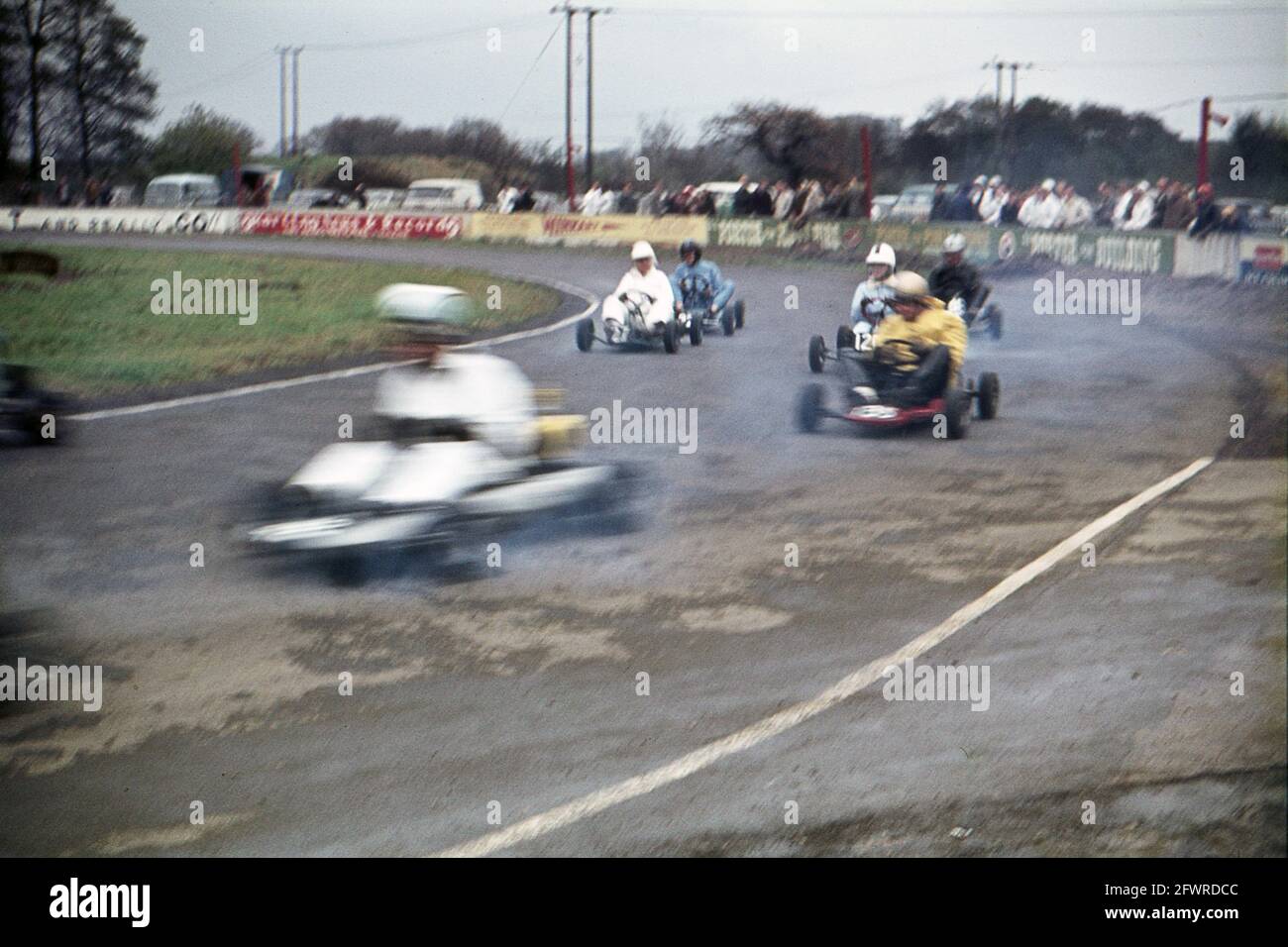 Drivers racing go-karts at a meeting held at Rye House Kart Circuit ...