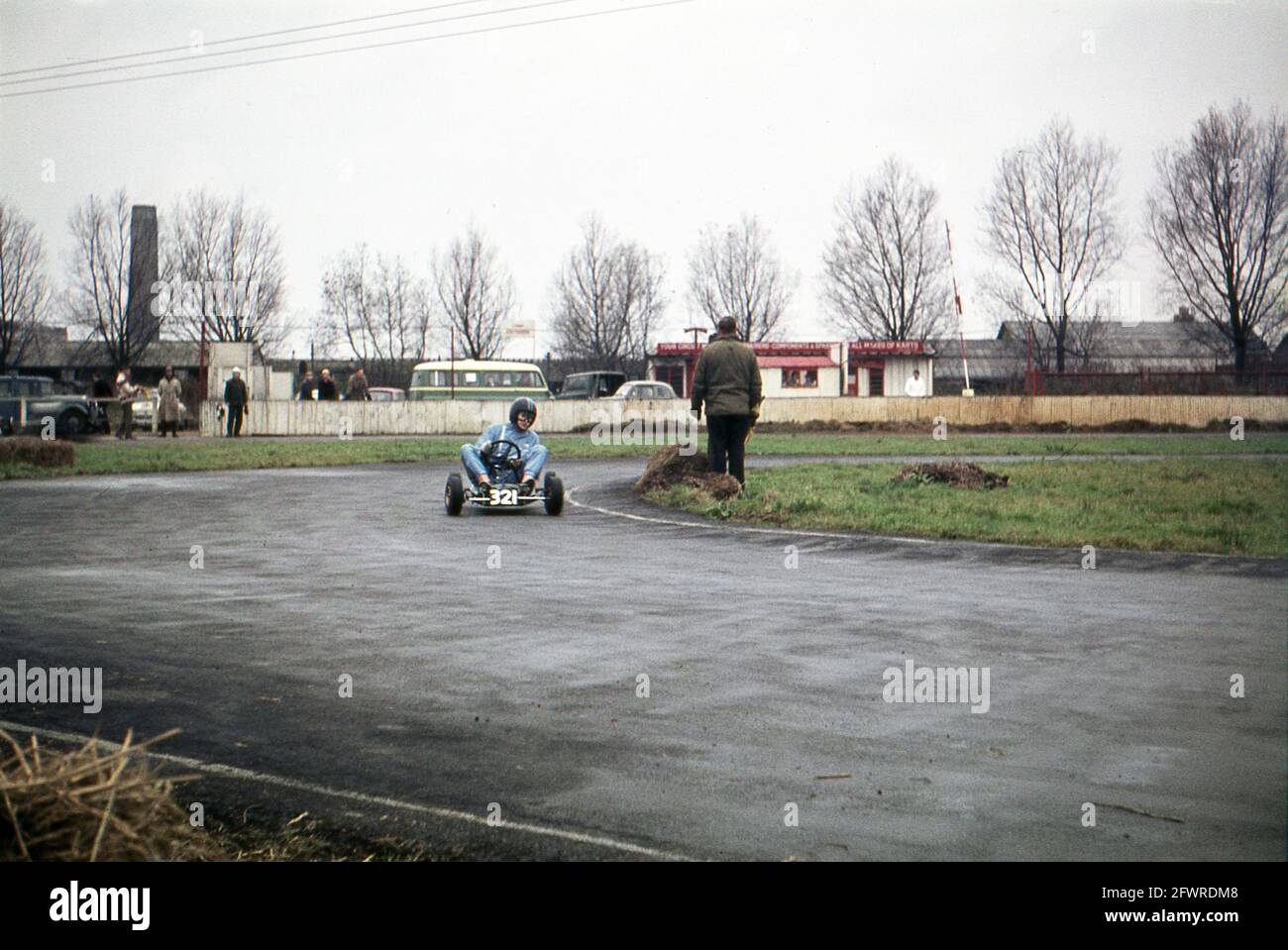 Driver racing a McCulloch go-kart at a meeting held at Rye House Kart ...