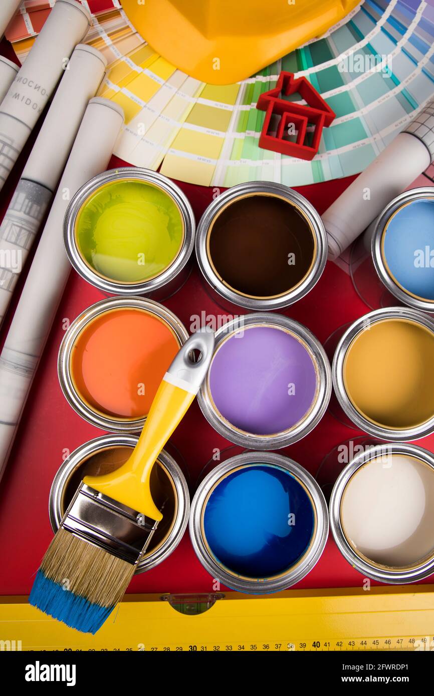 Paint brush, tin can and color guide samples Stock Photo - Alamy