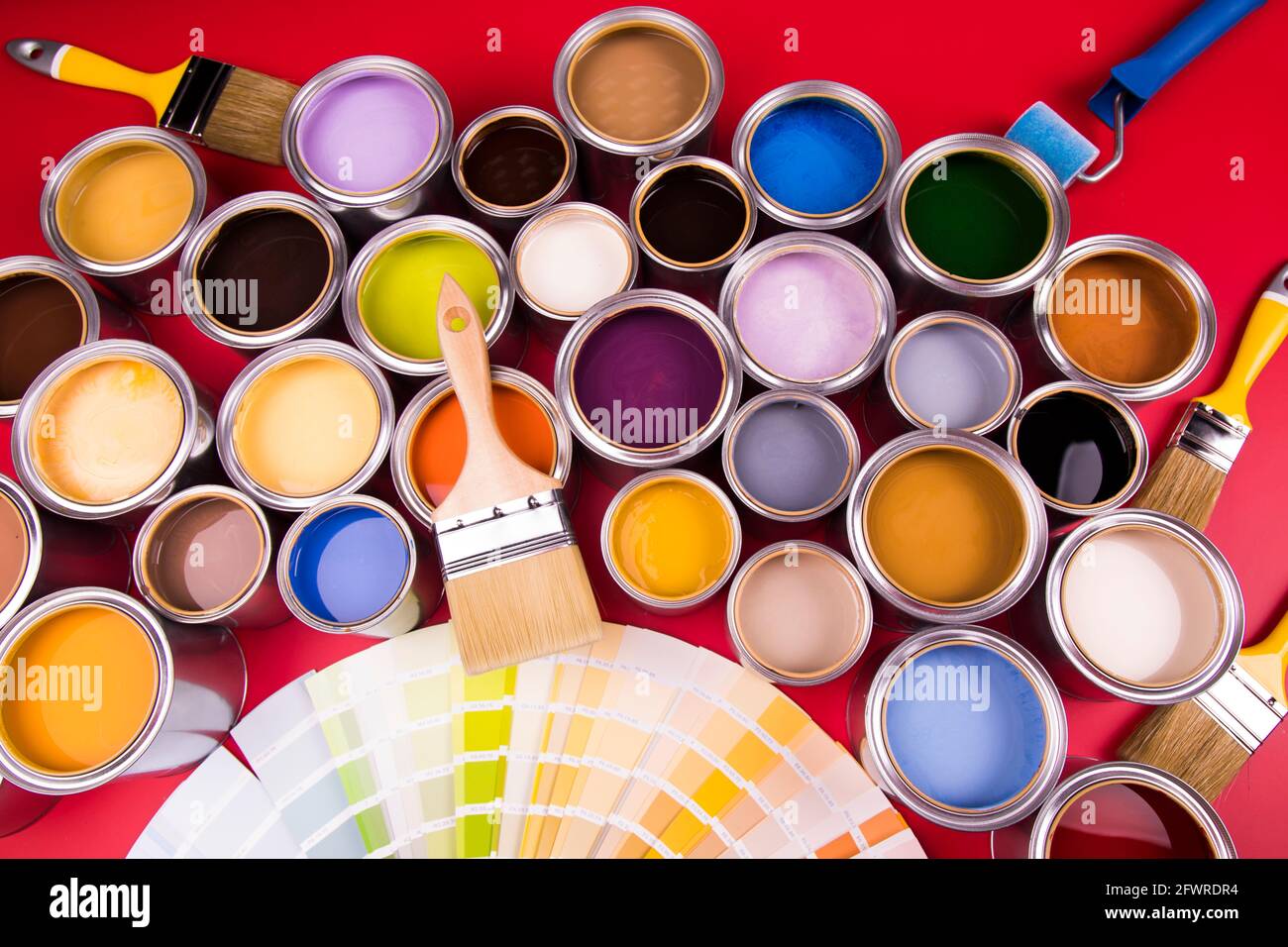 Open paint cans with a brush, Rainbow colors Stock Photo - Alamy