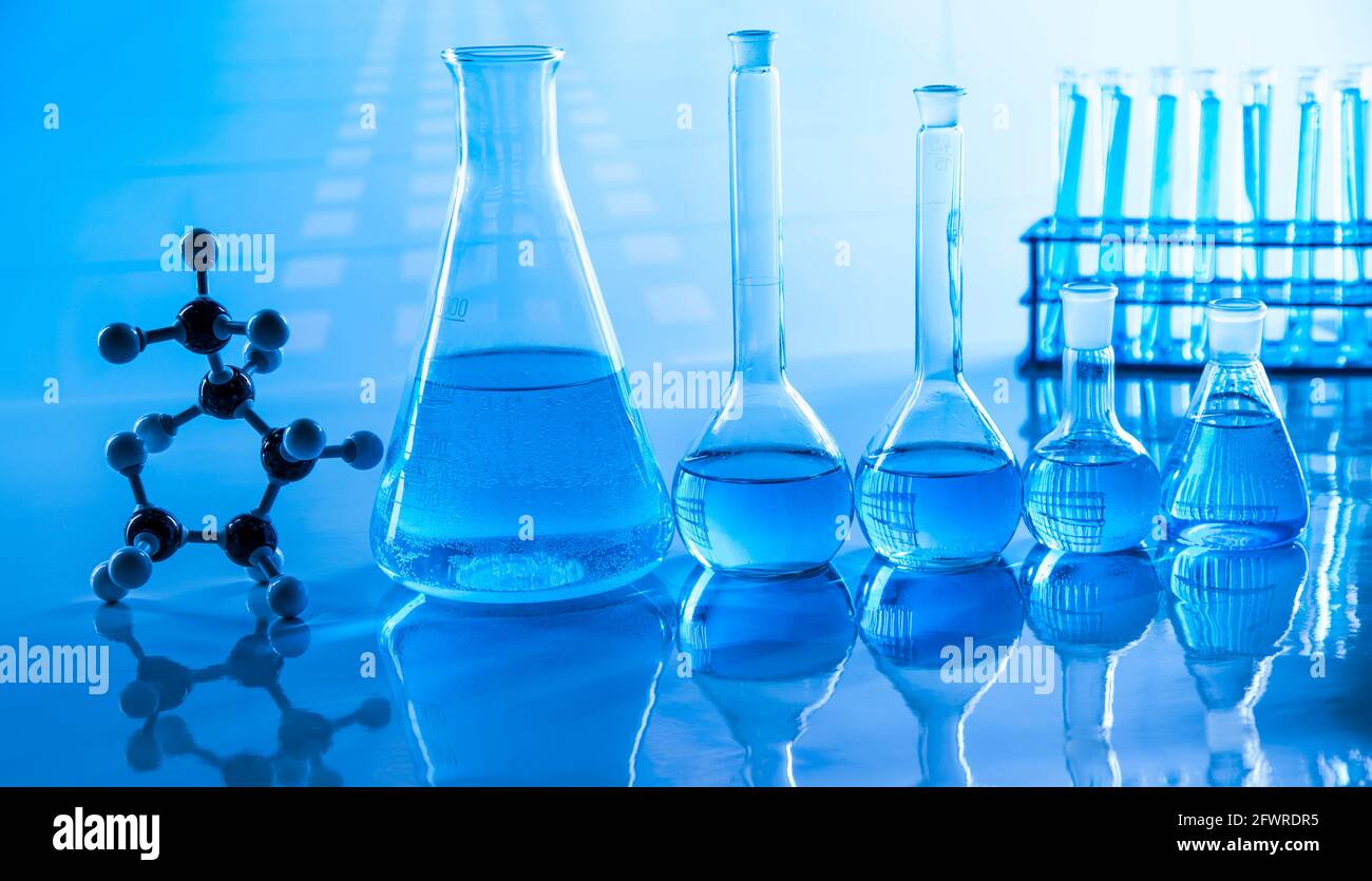 Laboratory equipment, glass filled background Stock Photo - Alamy