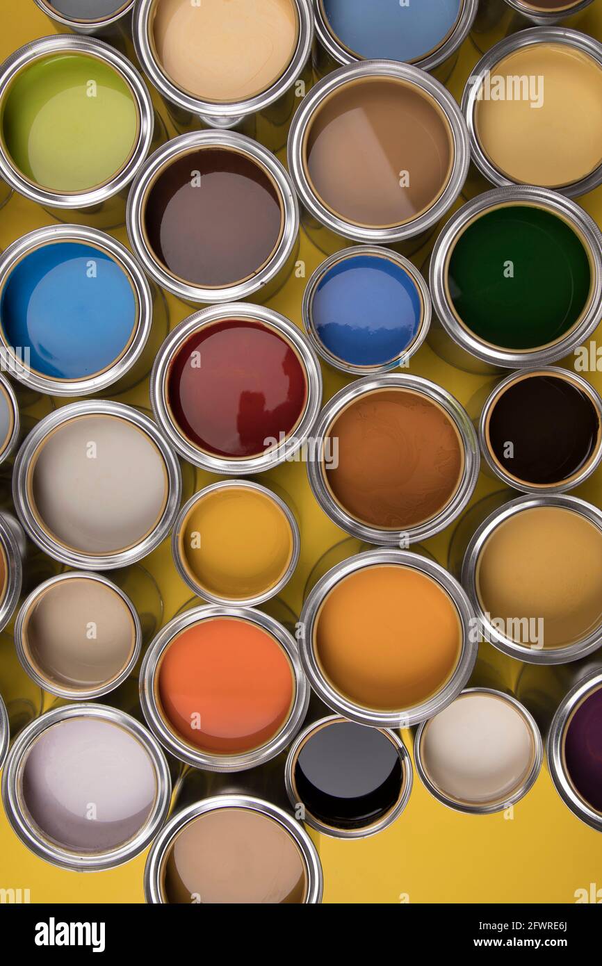 Open buckets with a paint, colors background Stock Photo - Alamy