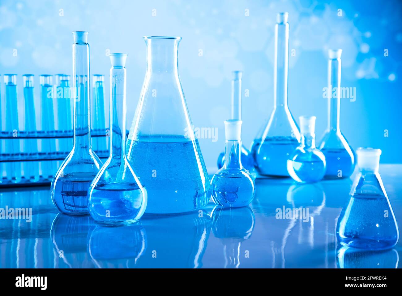 Laboratory equipment, glass filled background Stock Photo - Alamy