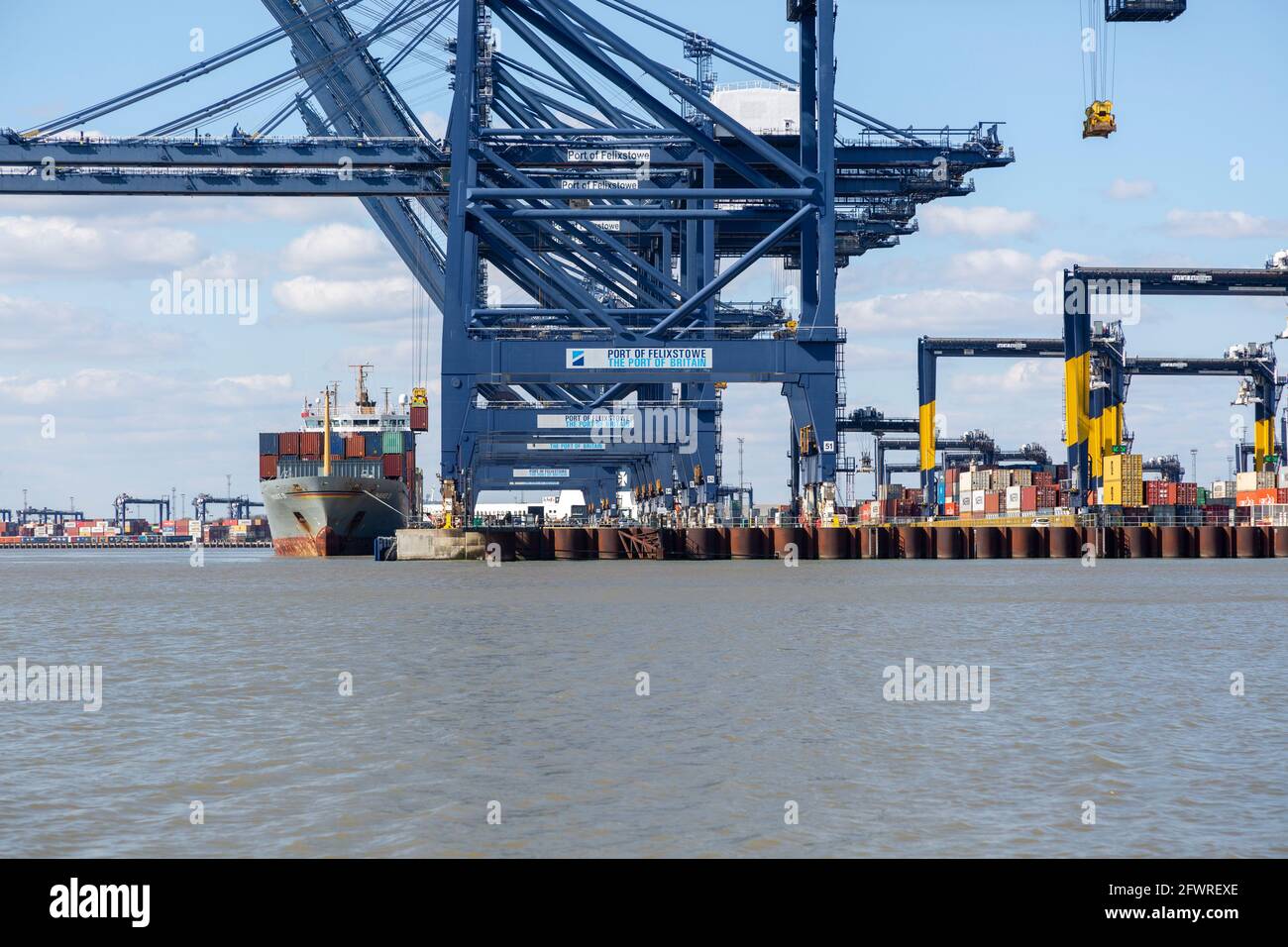 Gantry cranes on quayside at Port of Felixstowe, Suffolk, England, UK ...