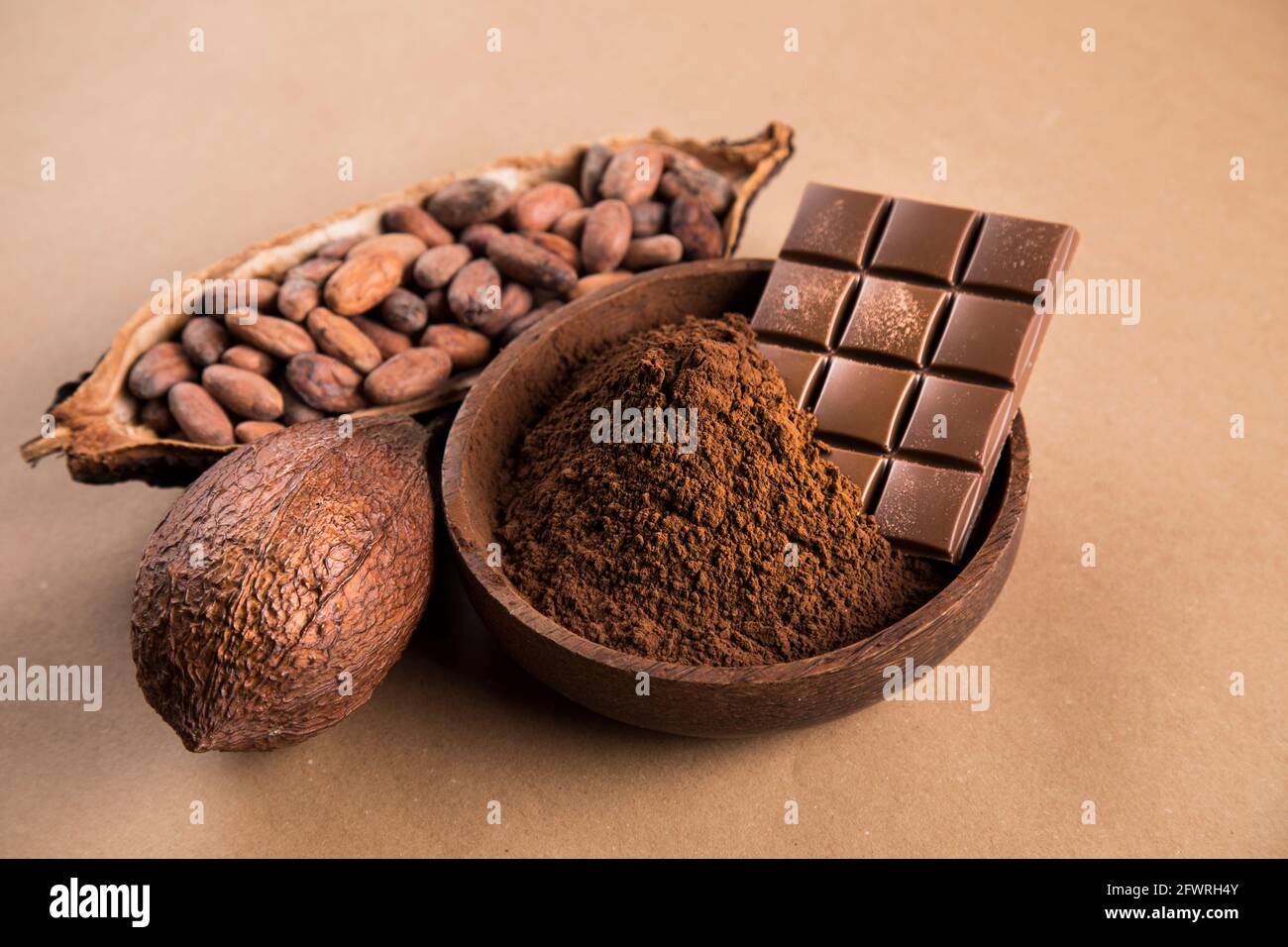 Cocoa pod and chocolate bar and food dessert background Stock Photo - Alamy