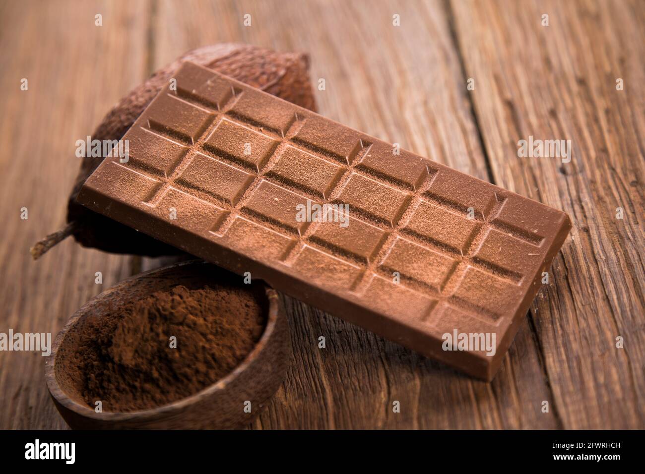 Chocolate bar, candy sweet, cacao beans and powder Stock Photo - Alamy