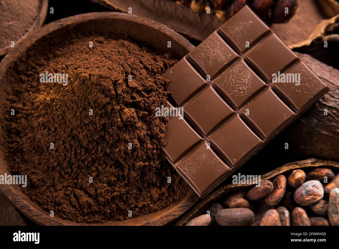 Chocolate bar, candy sweet, cacao beans and powder Stock Photo - Alamy