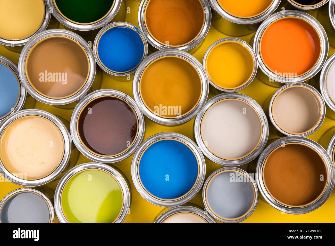 Open buckets with a paint, colors background Stock Photo - Alamy