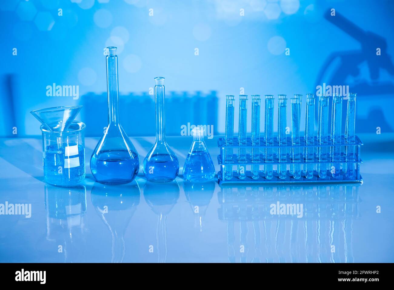 Laboratory equipment, glass filled background Stock Photo - Alamy