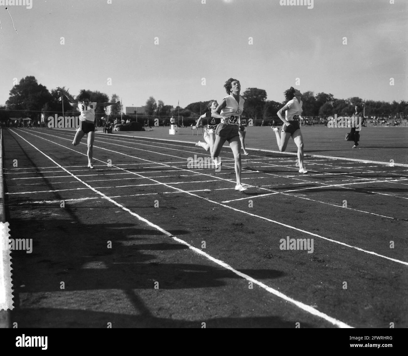 In action of 100 meters Black and White Stock Photos & Images - Alamy